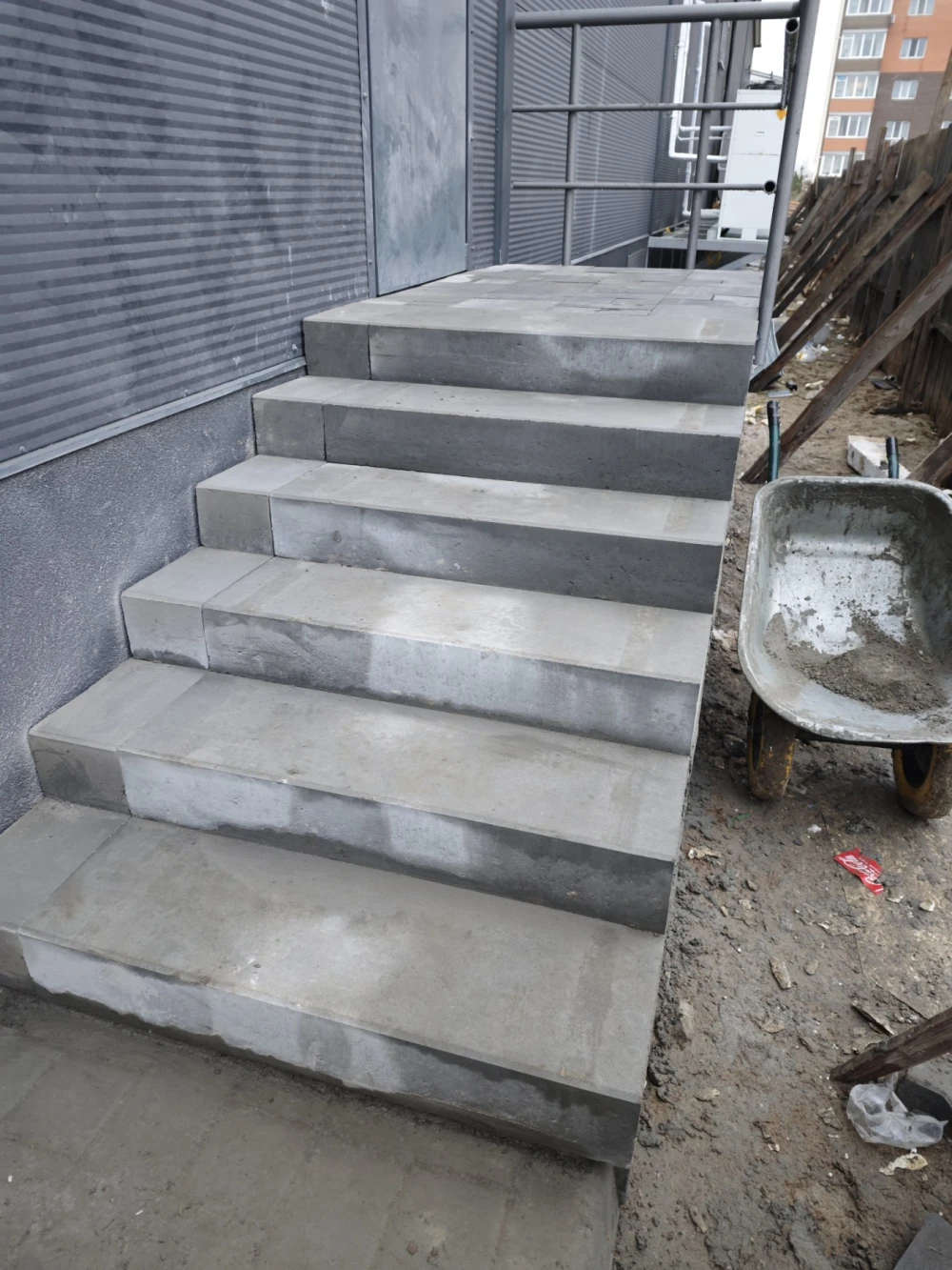 Laying paving slabs and decorating entrance groups for the ATB store in ...